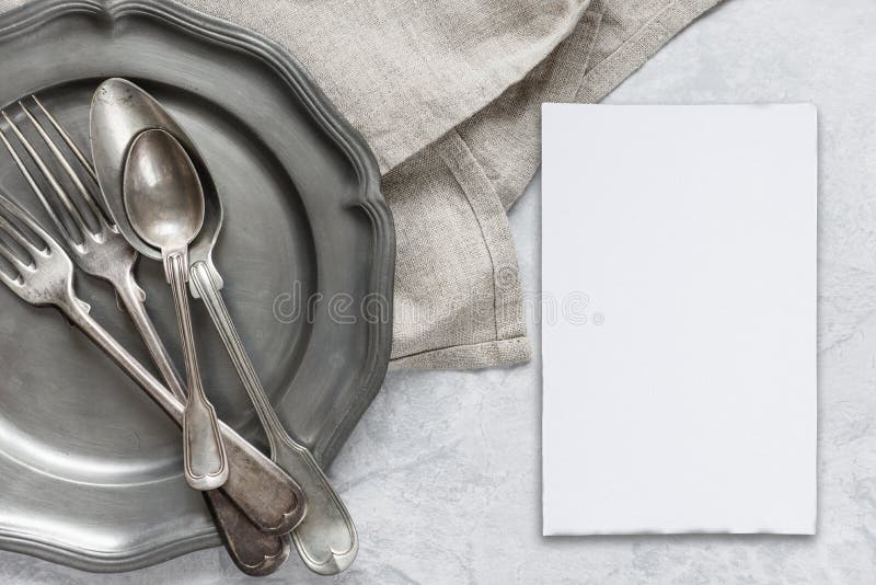 Silverware on a Pewter Plate Stock Photo - Image of forks, blank: 101856428