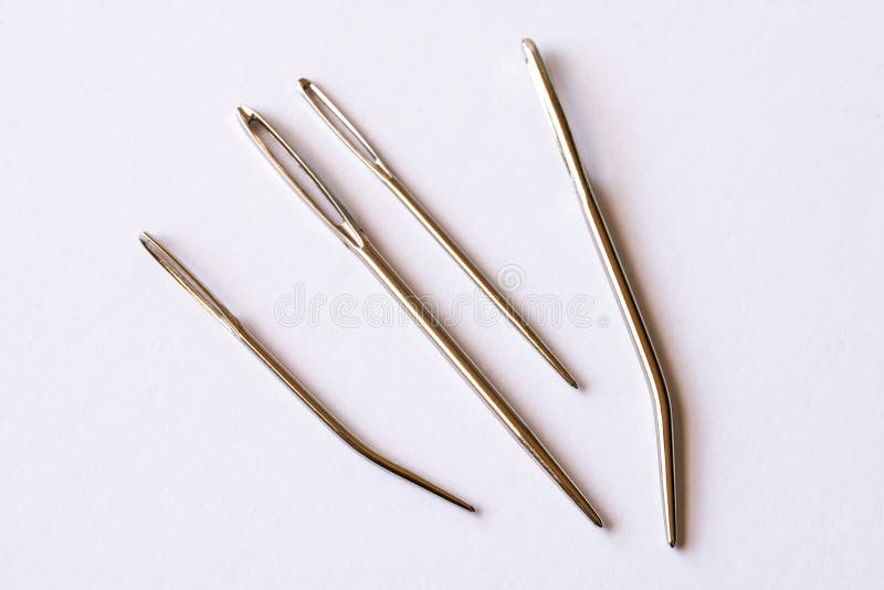 Various Sized Yarn Needles on White Background Stock Image - Image of ...