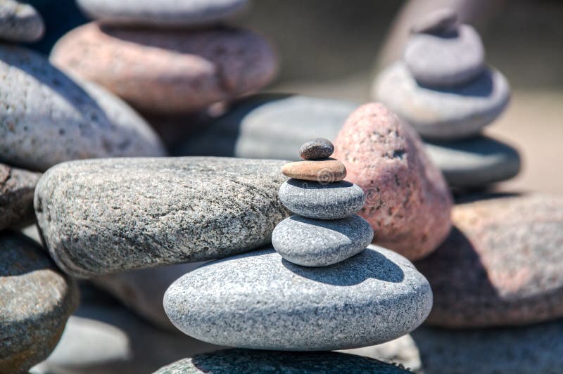 Various Sizes and Colors Pebbles Stacked on a Beach Stock Image - Image ...