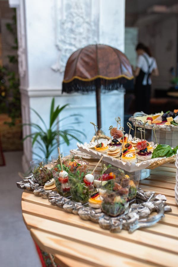Various Snacks and Drinks on the Table at the Event Stock Photo - Image ...