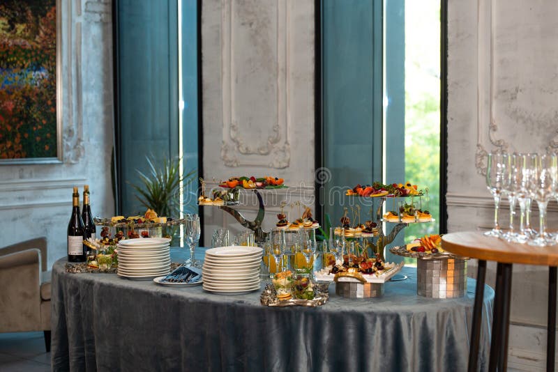Various Snacks on Stands on the Buffet Table. Self-service at the Event ...