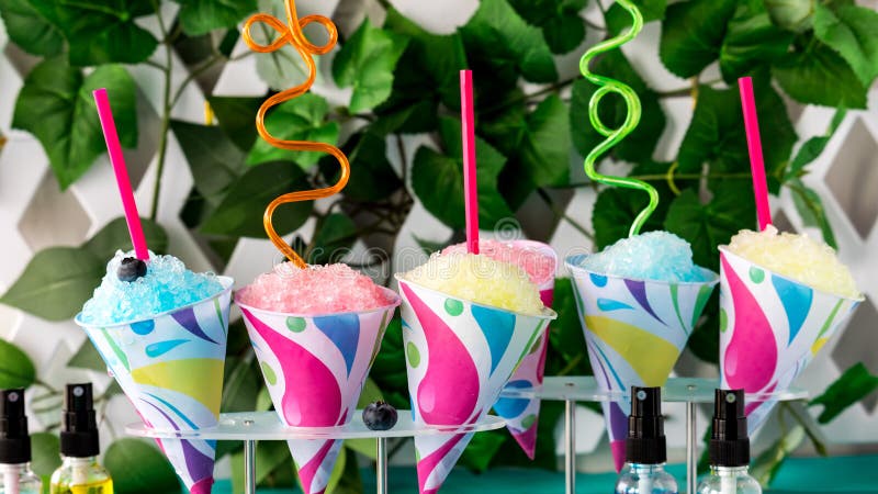Various Snow Cones with Crazy Straws Ready for Sharing. Stock Image ...
