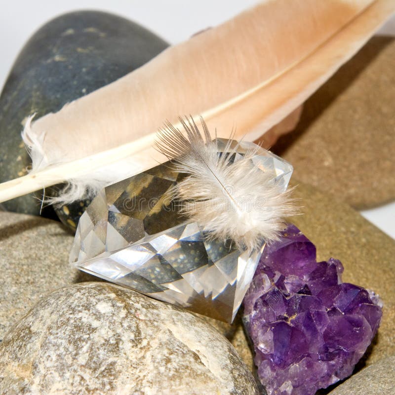 Various stones and feather stock photo. Image of mineral - 47307004