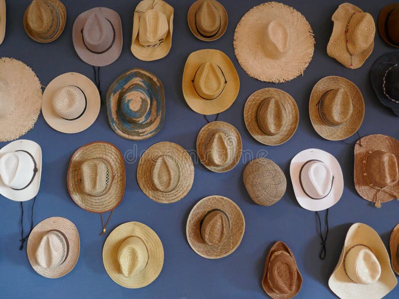 Many Various Straw Hats on a Blue Wall Stock Image - Image of design ...