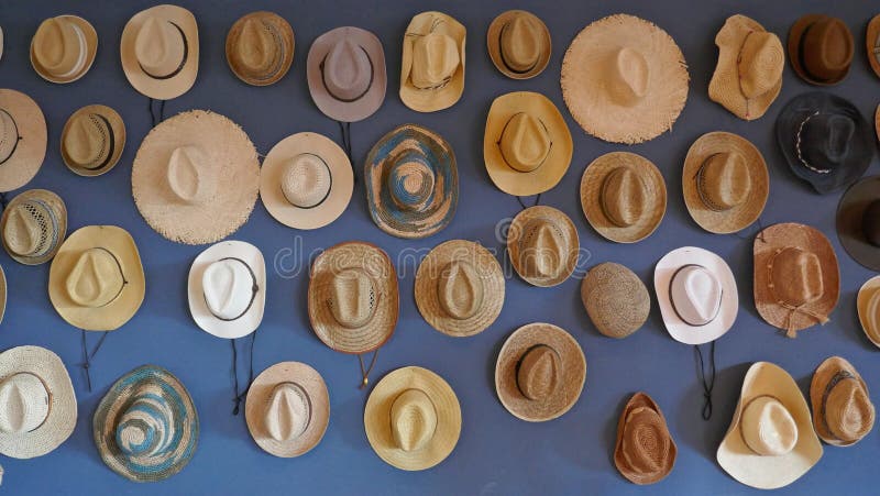 Many Various Straw Hats on a Blue Wall Stock Image - Image of decorate ...