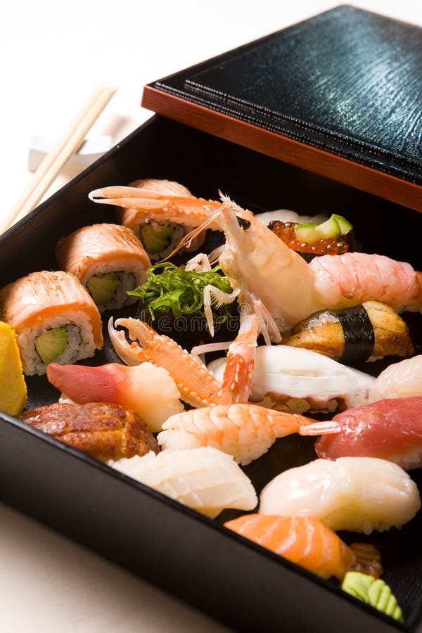 Various sushi in a box stock photo. Image of leaves, healthy - 17249504