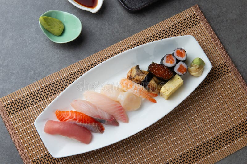Various Sushi Sashimi stock photo. Image of asia, black - 124666694