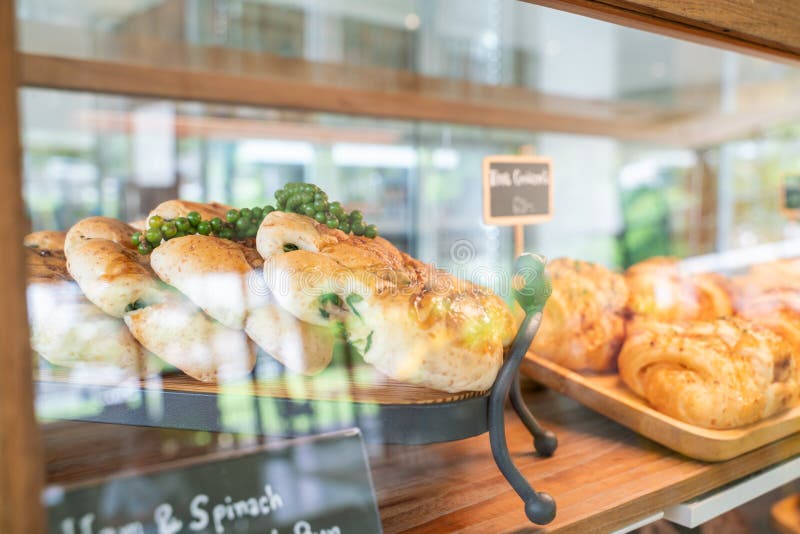 Various Sweet Bakery with Sausage and Chocolate in Glass Box Stock ...