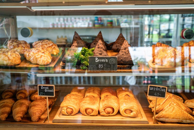Various Sweet Bakery with Sausage and Chocolate in Glass Box Stock ...