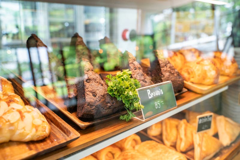 Various Sweet Bakery with Sausage and Chocolate in Glass Box Stock ...