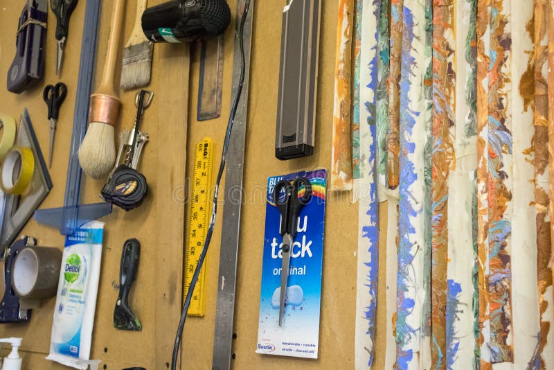 Various Tools for Art Crafting and Making Hanging on a Display Board ...