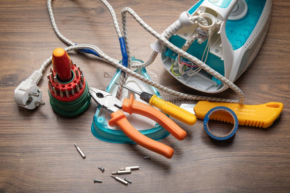 Various Tools and Broken Iron. Iron Repair Stock Image - Image of ...