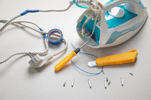 Various Tools and Broken Iron. Iron Repair Stock Image - Image of ...