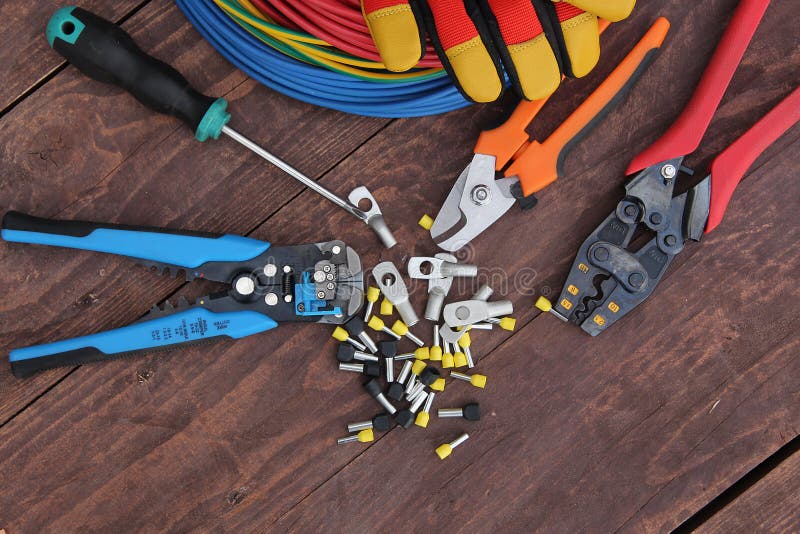 Tools for Electrical Work Laid Out on a Wooden Surface of Brown Stock ...