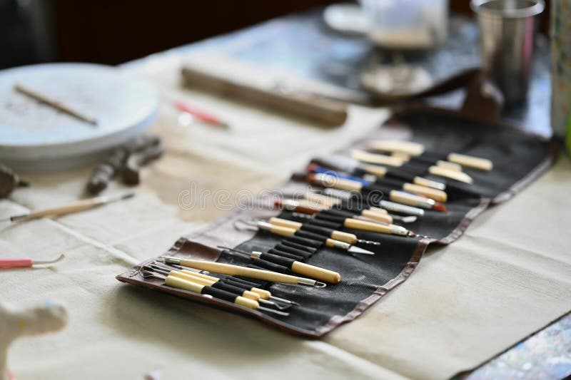 Various Tools for Pottery on Table in Workshop. Handicraft, Creativity ...