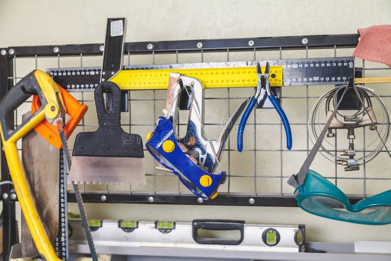 Various Tools Weigh on Vertical Mesh Rack Stock Image - Image of blank ...