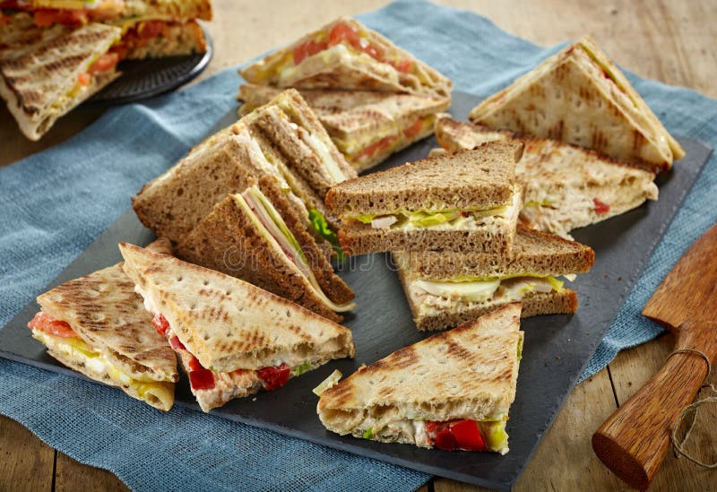 Various Triangle Sandwiches Stock Photo - Image of salmon, cooking ...