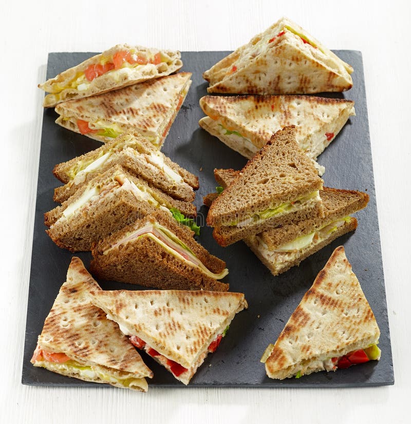 Various Triangle Sandwiches on Wooden Board Stock Photo - Image of fast ...