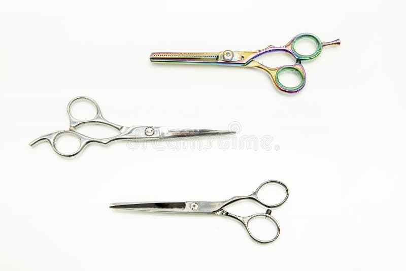 Various Types of Barber Scissors on a White Wooden Surface Viewed from ...