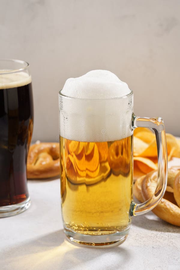 Various Types of Beer - Light and Dark and Snack Variety Stock Photo ...