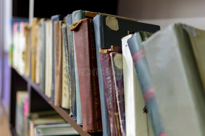 Various Types of Books on a Library Shelf Stock Image - Image of ...