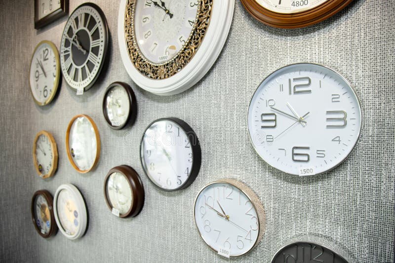 Various Types and Brands of Wall Clocks. Wall Clocks Hanging on the ...