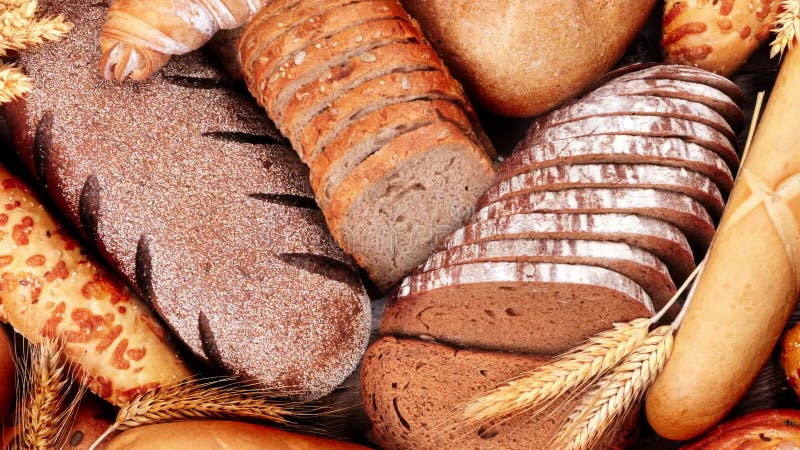 Various Types of Bread and Spikelets Lying on the Table. Slider Passage ...