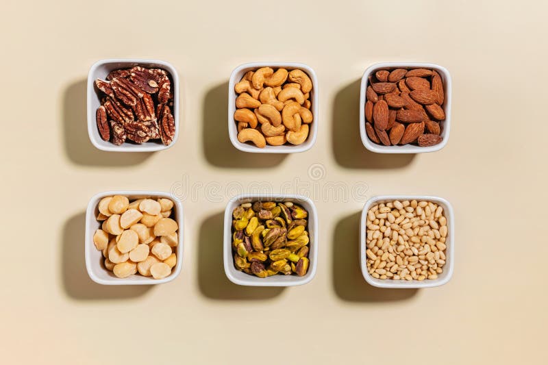 Various Types of Dry Nuts in a Small Bowls, Overhead View. Stock Image ...