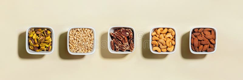 Various Types of Dry Nuts in a Small Bowls, Overhead View. Stock Image ...