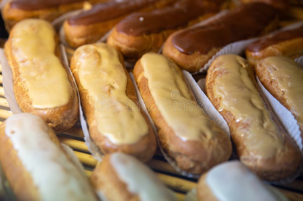 Various types of eclairs stock photo. Image of freshly - 285989700
