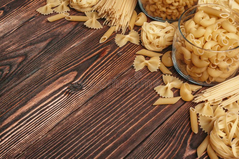 Various Types of Italian Pasta Rustic Background Stock Photo - Image of ...