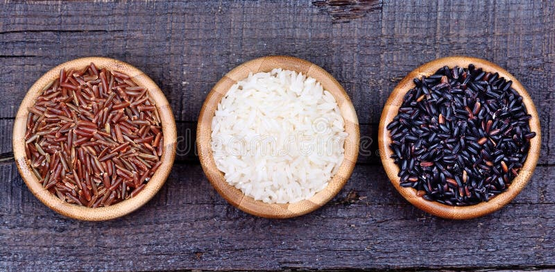 Various Types of Rice in a Bamboo Bowl on Table Stock Photo - Image of ...