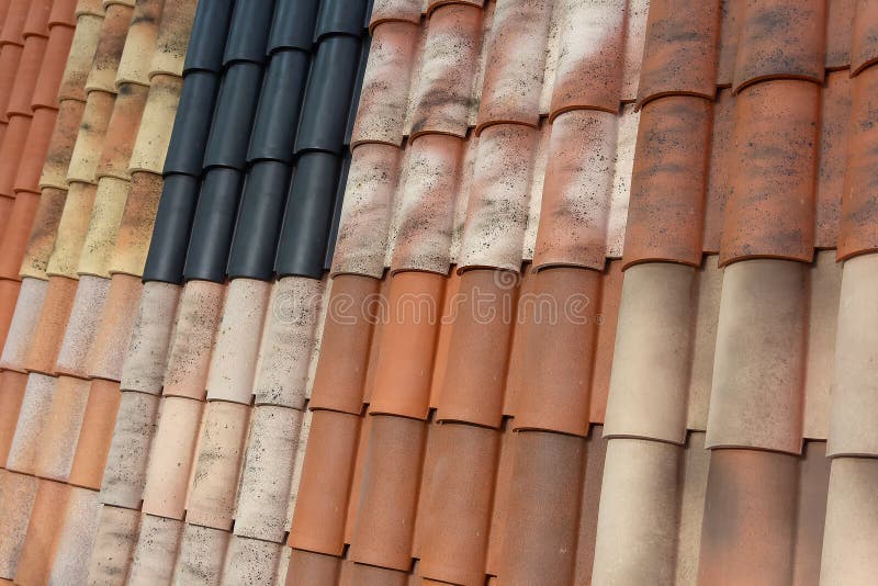 Various Types of Roof Coverings in the Window of a Construction Store ...