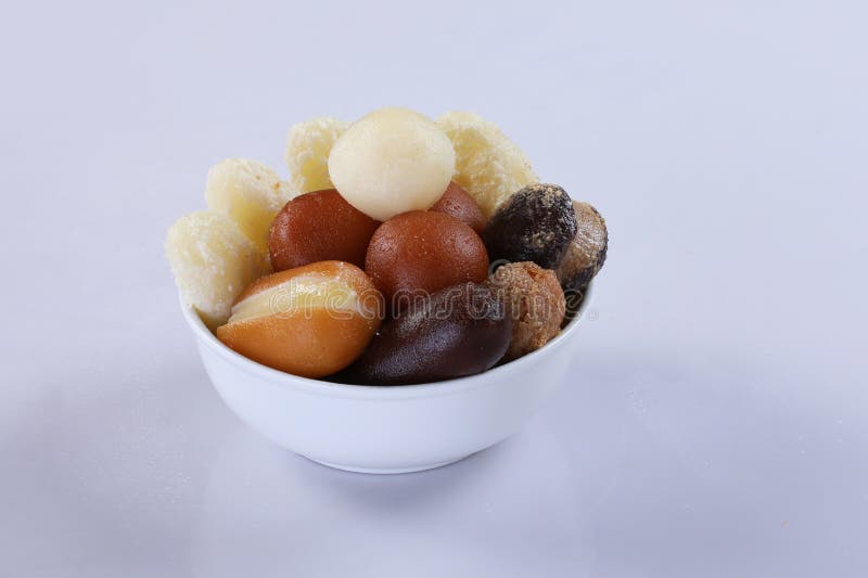 Various Types of Sweets in a Bowl Isolated on White Stock Image - Image ...