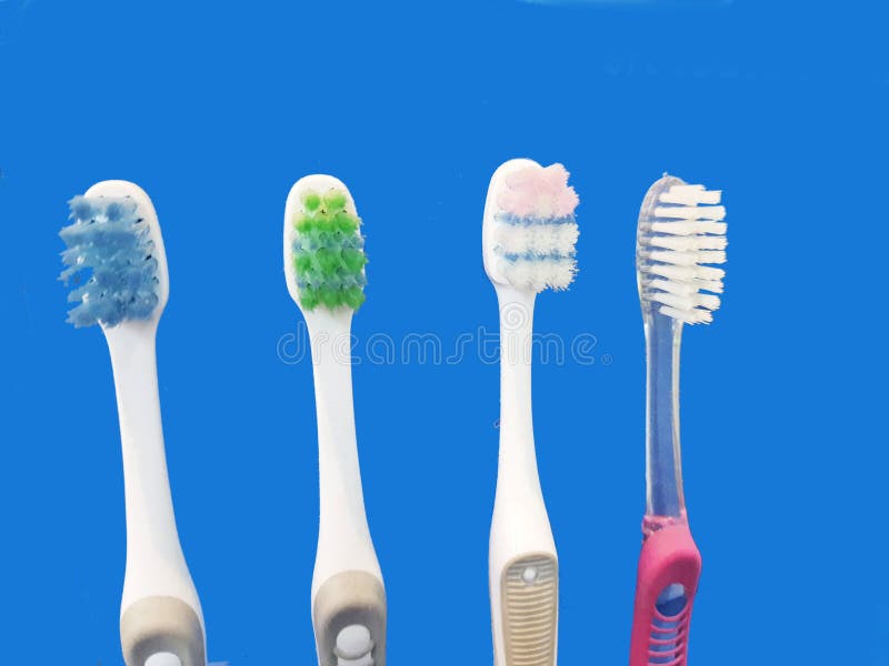 Various Types of Toothbrush, Isolated on a Blue Background Stock ...