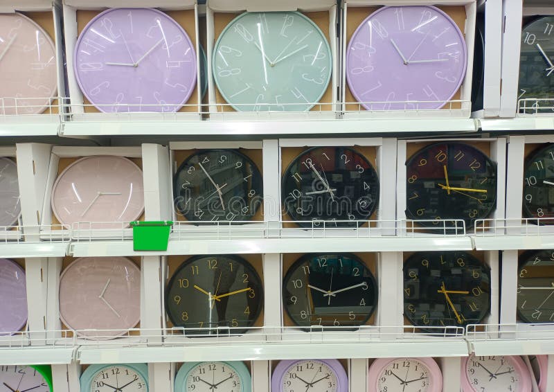 Various Types of Wall Clocks Displayed on the Shelves Stock Photo ...