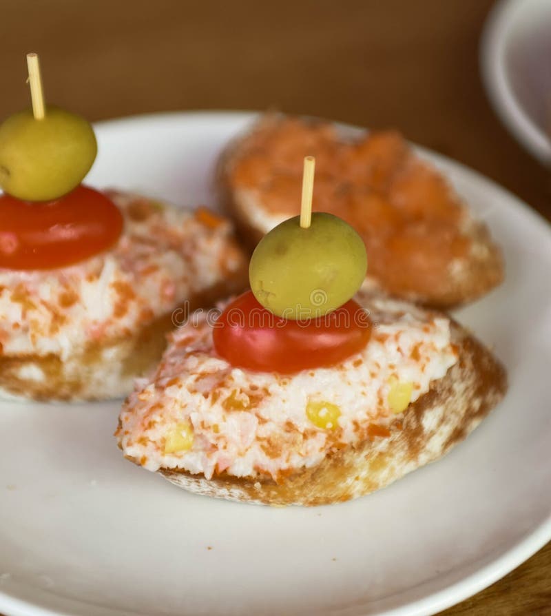 Various Typical Spanish Canapes, with Ham, Crab and Tuna Stock Photo ...