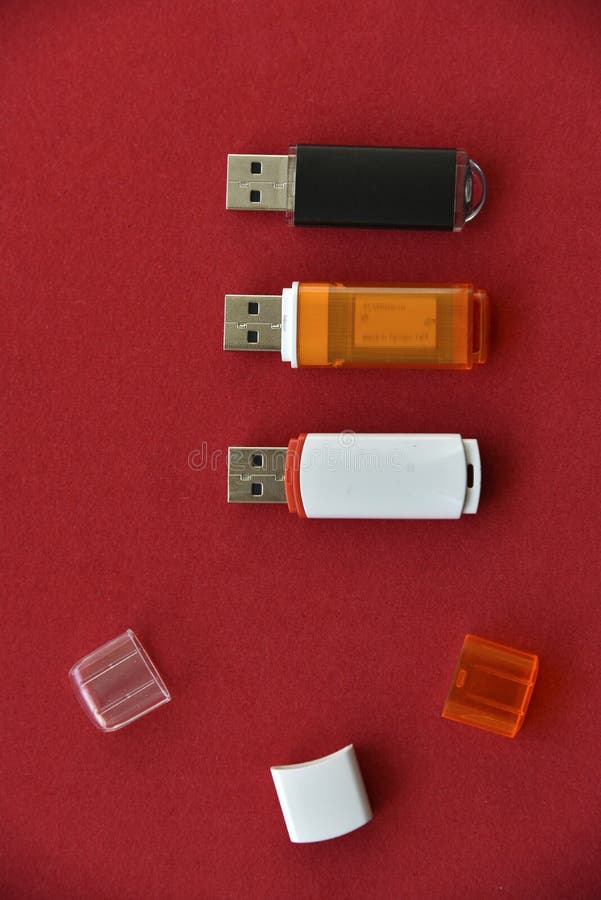 Various USB Flash Drives on a Red Background Stock Image - Image of ...
