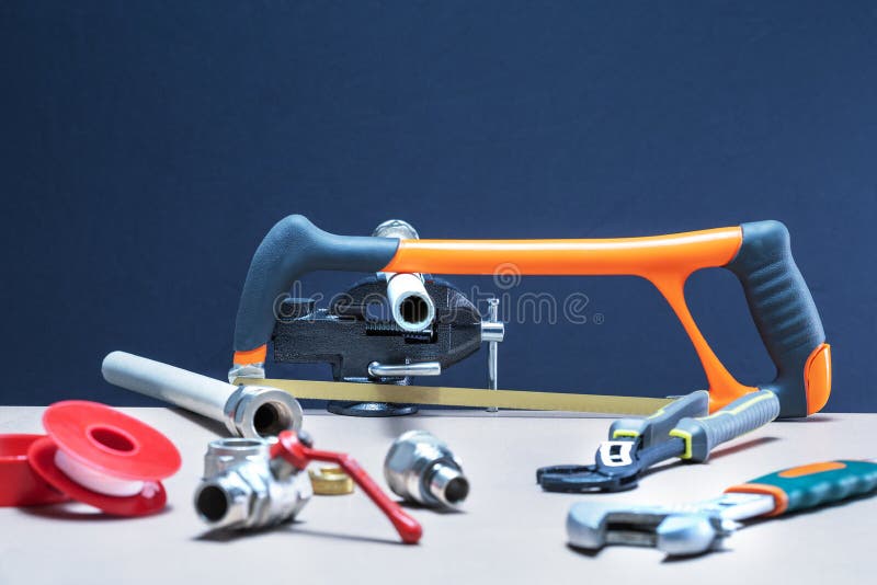 Various Water System Accessories, Tools on the Table of Workplace ...