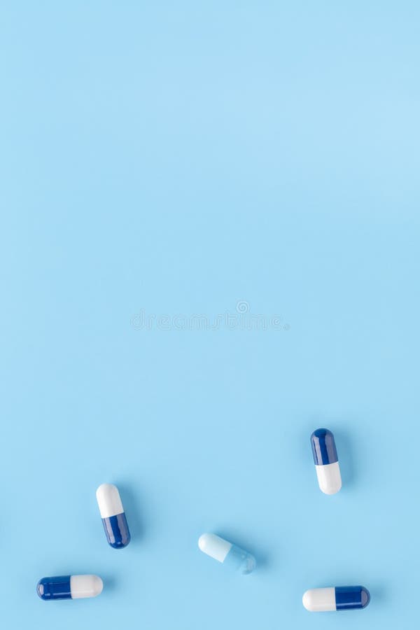 Various White-blue Medication Capsules. Blue Background with Text Space ...