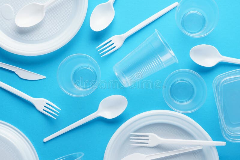Various White Plastic Disposable Tableware on Blue Background Stock ...