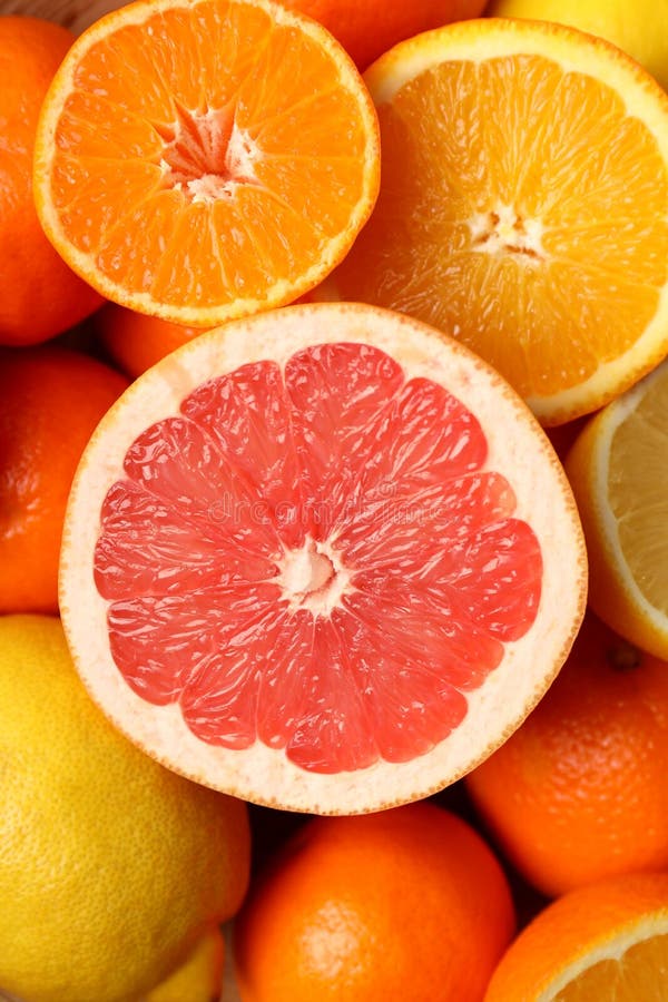 Various Whole and Half Citrus Fruits, Close Up Stock Image - Image of ...