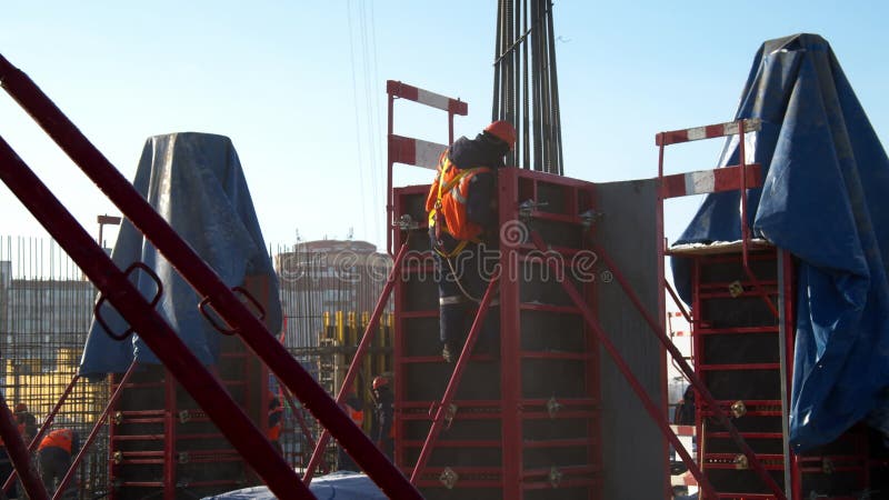 Various Work Scenes during Day at Stadium Construction Site Stock ...