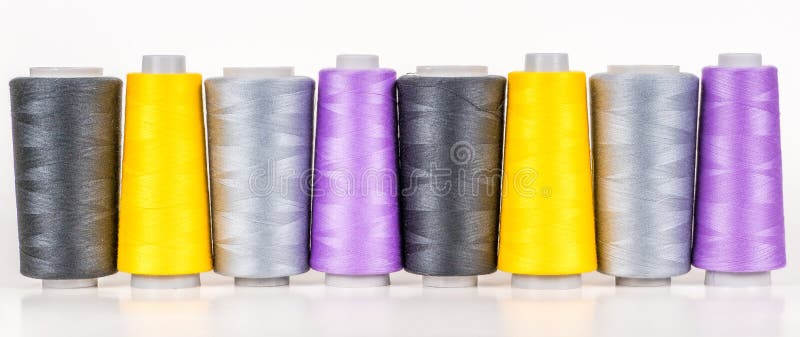 Vary colored thread coils stock photo. Image of fabric - 103282588