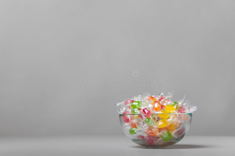 Vase with colour sweets stock image. Image of reception - 37259173