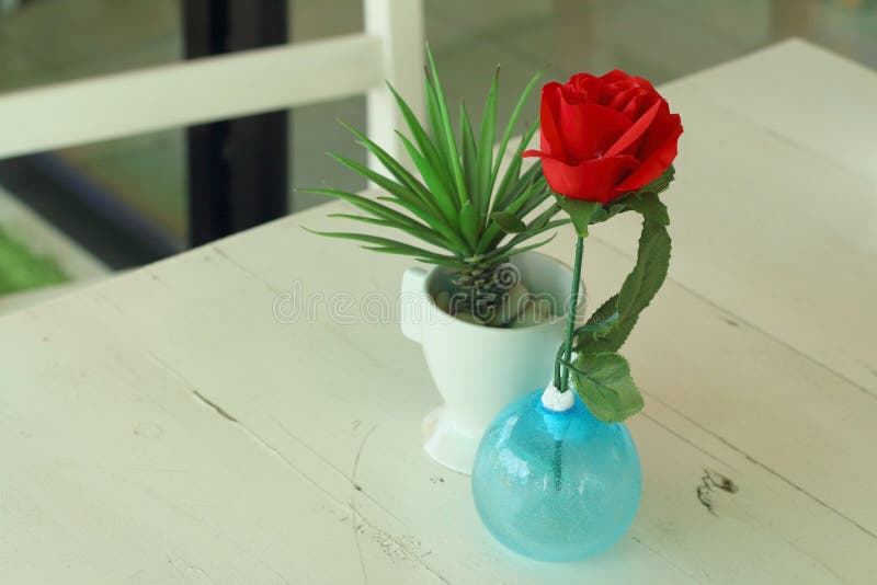 Vase of Red Flowers on a Table Stock Image - Image of bright, design ...