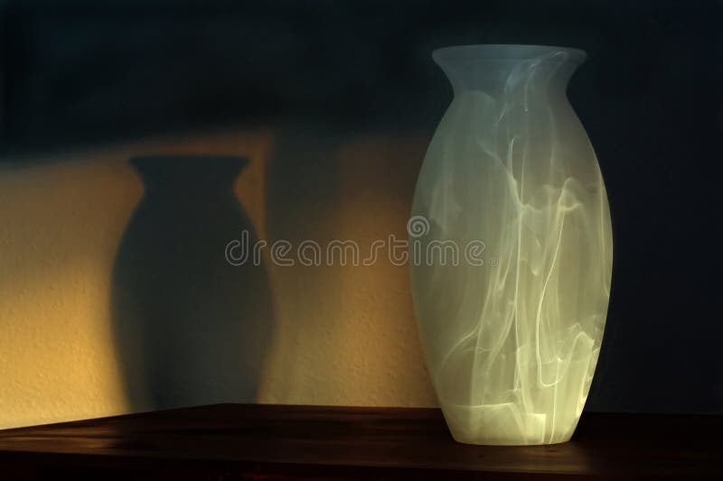 Vase and Shadow at Sunset stock image. Image of light - 3165719