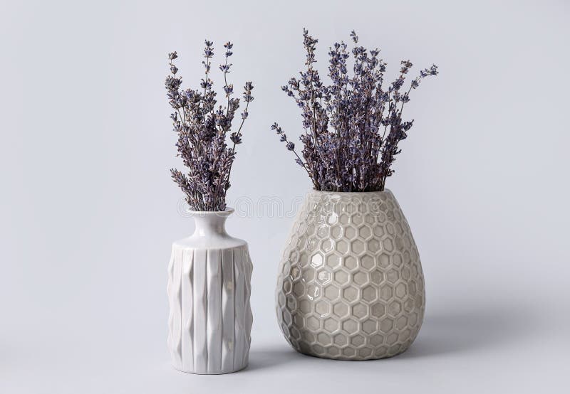 Vases with Beautiful Lavender Flowers on Grey Background Stock Photo ...