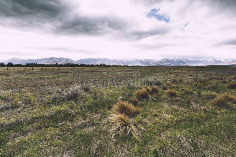 A Vast Farmland with Mountain in the Background. Stock Photo - Image of ...