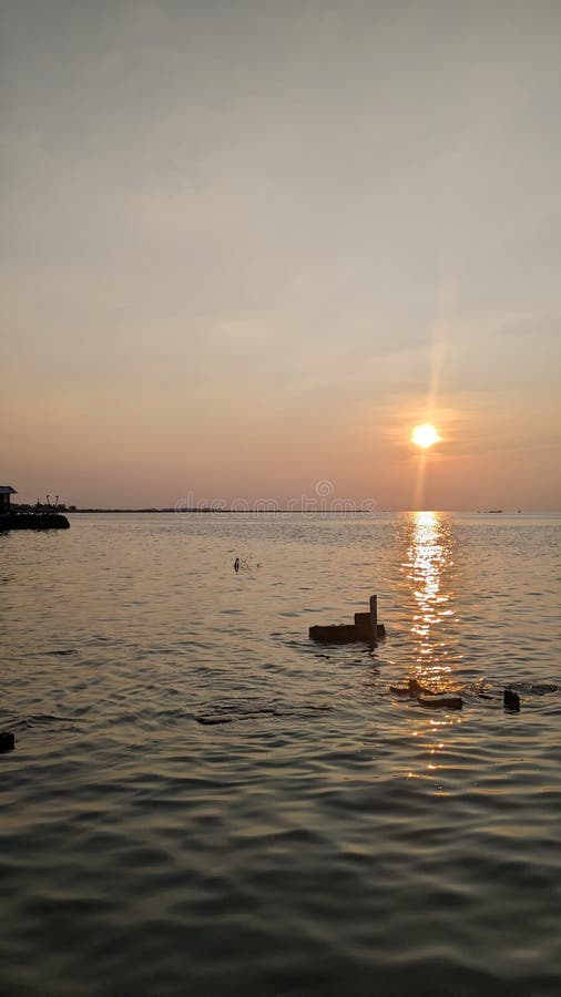 The Vast Ocean with the Sun almost Setting on the Western Horizon Stock ...